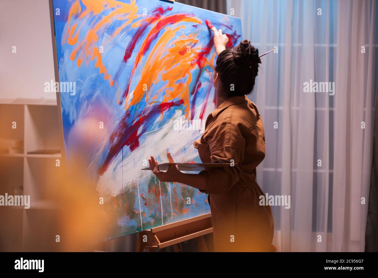 Masterpiece painting in art workshop by innovative painter. Modern ...