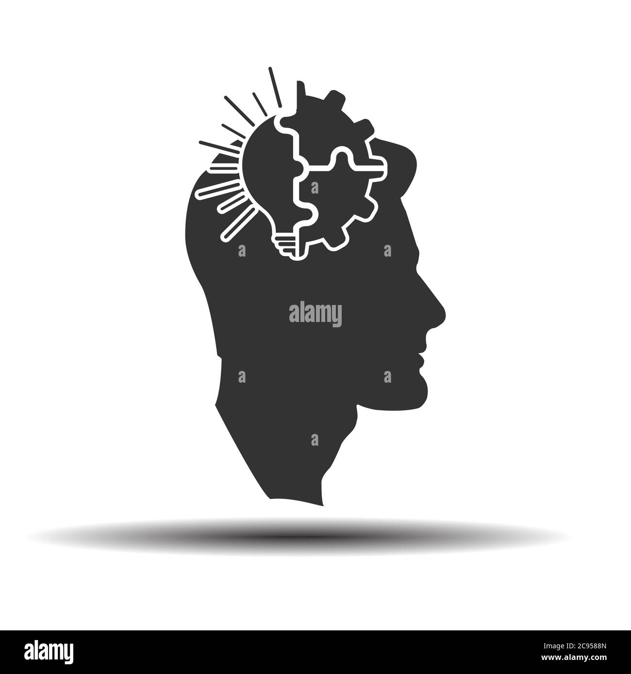 Light bulb and gear combined with the silhouette of a man's head. A ...