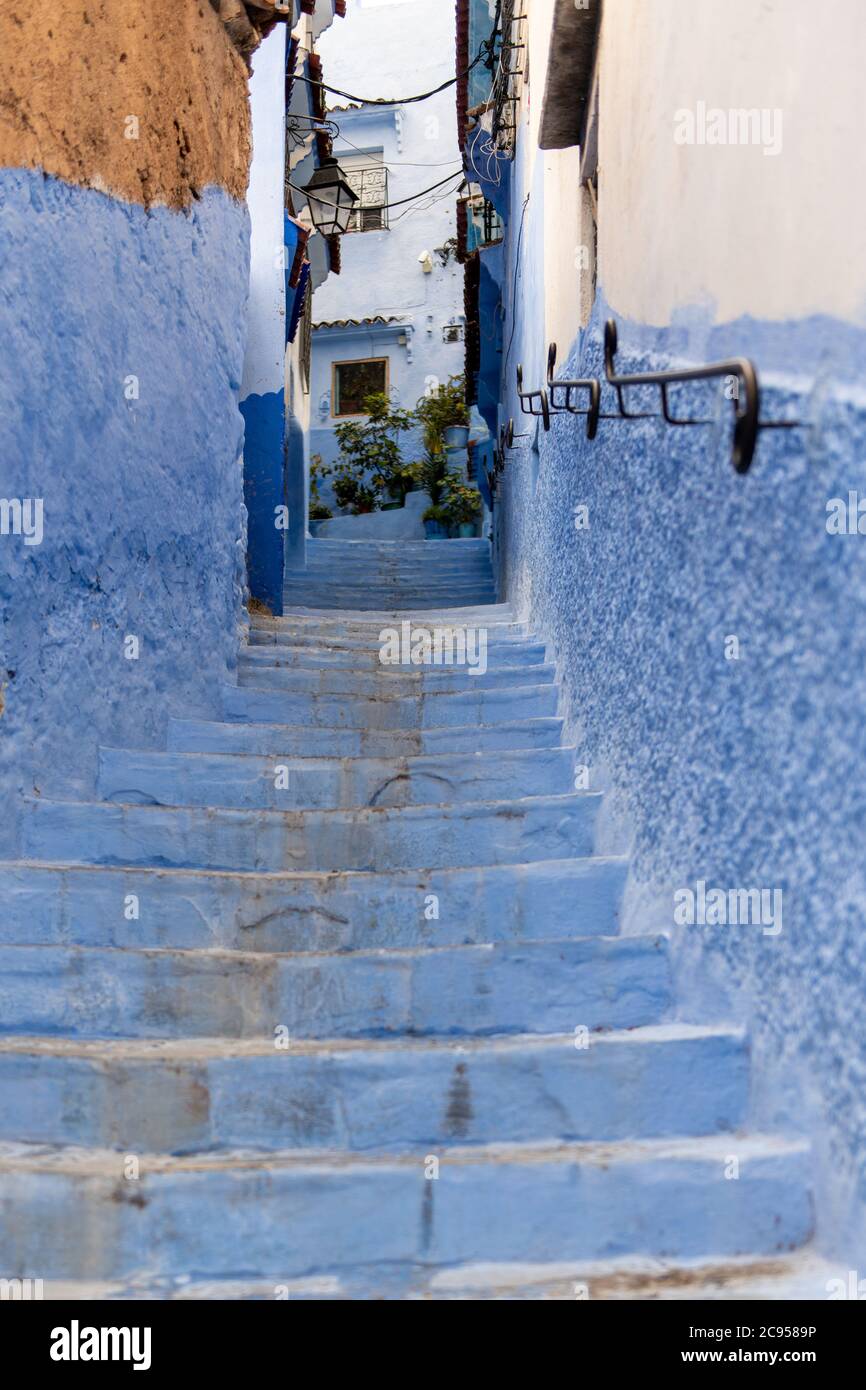 Blue-tinted buildings predominate in the city of Chefchaouen, Morocco ...