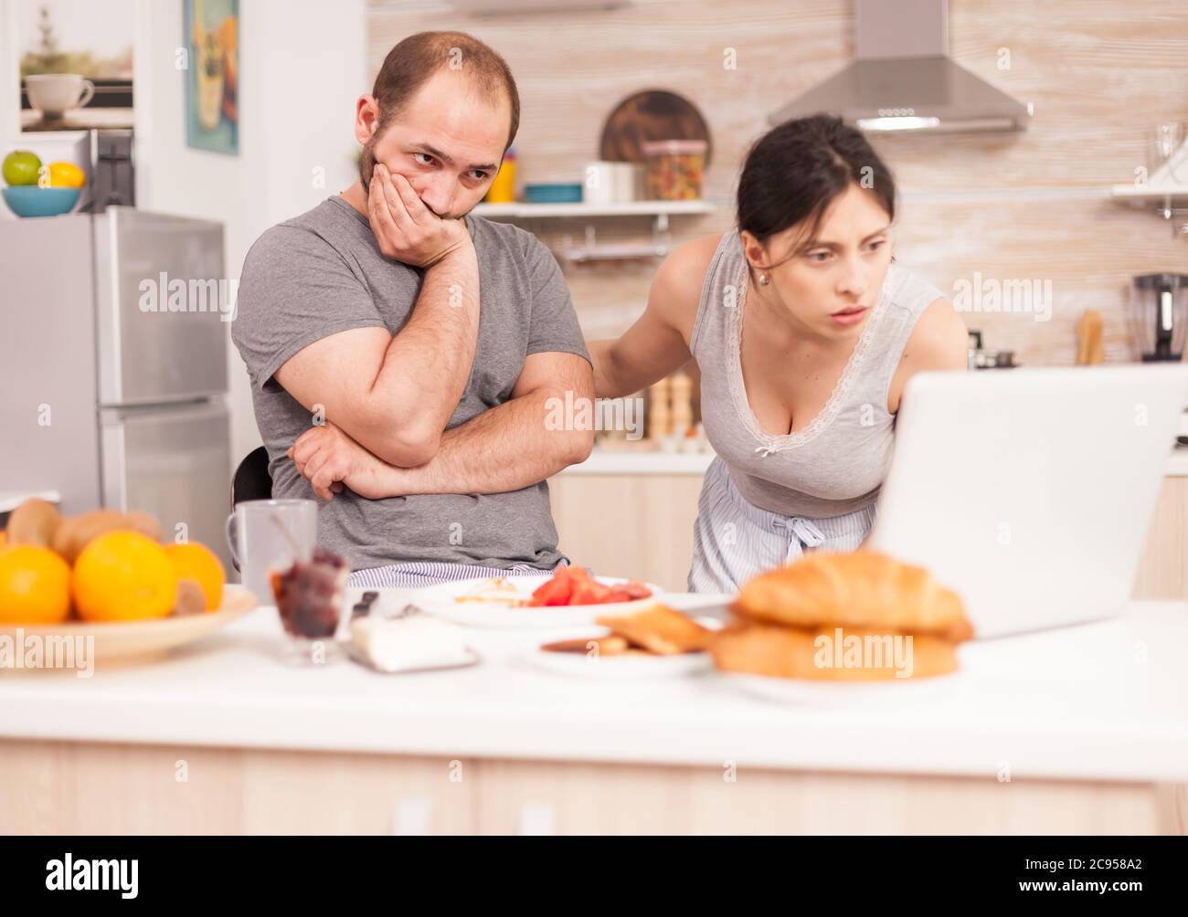 Couple home meal unhappy hi-res stock photography and images - Alamy