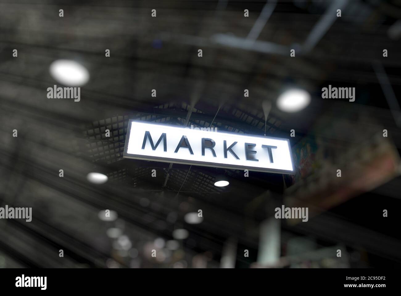 Night market, entrance sign with light rays Stock Photo - Alamy
