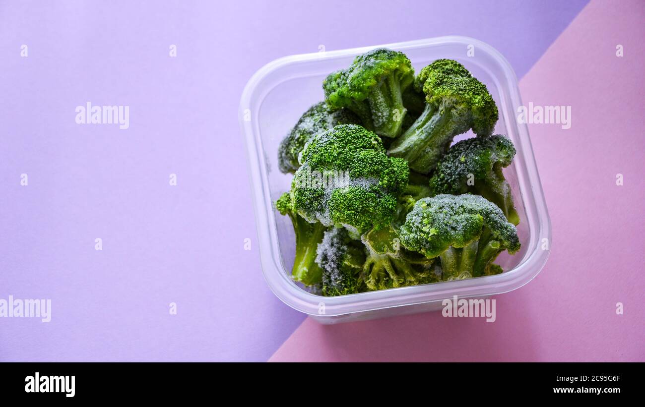 Broccoli in a plastic container for long-term storage. Deep freezing of ...