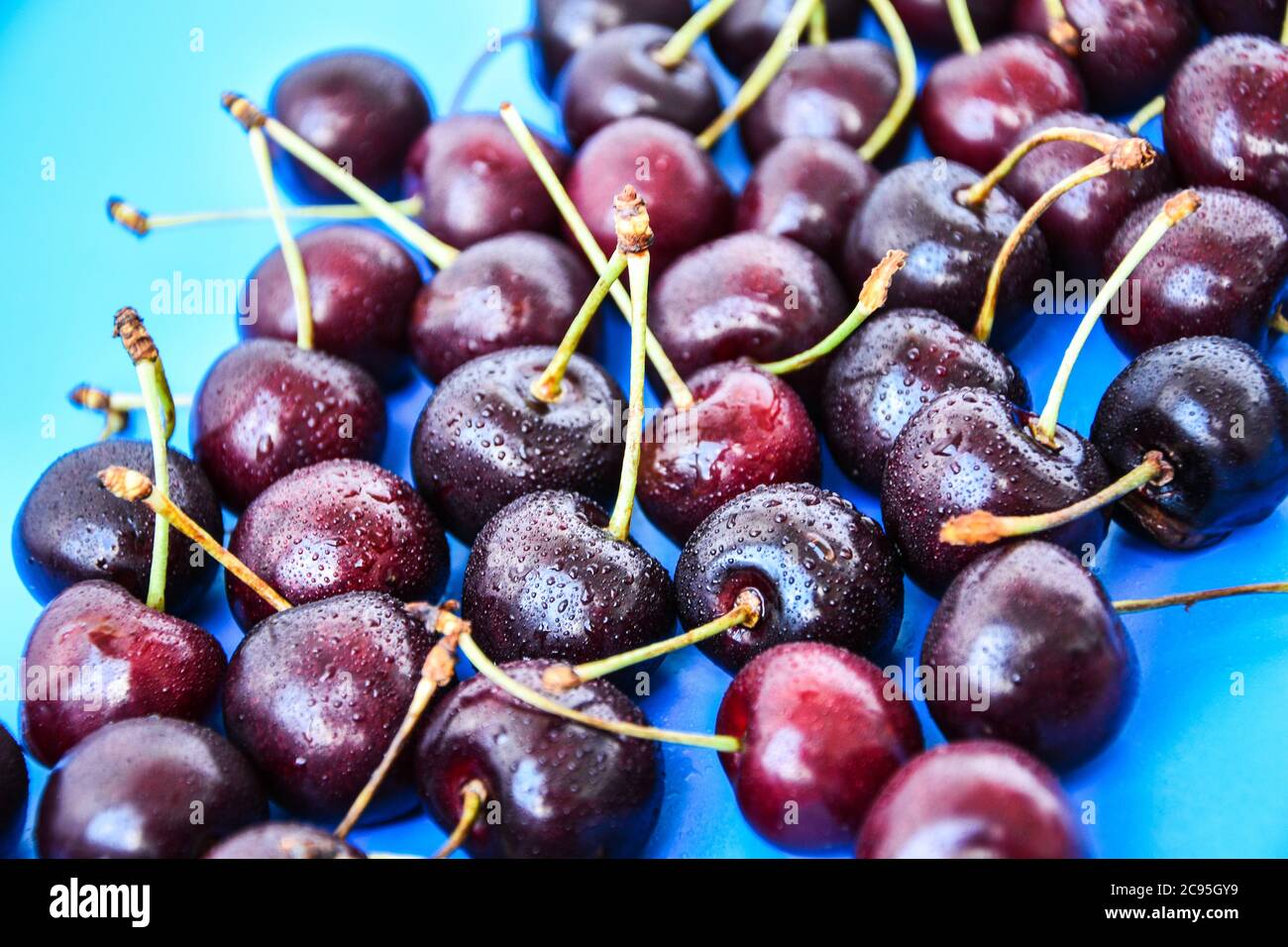 Ripe cherry texture background. Summer june fruit harvest. Free copy ...