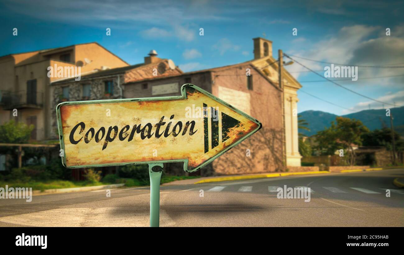Street Sign the Direction Way to Cooperation Stock Photo - Alamy
