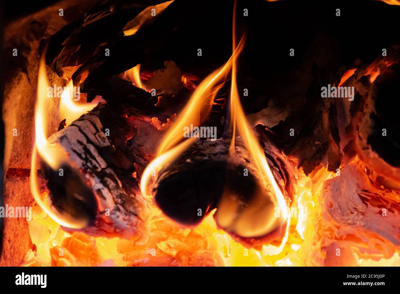 Closeup photo of blazing and warming fire in the stove Stock Photo - Alamy