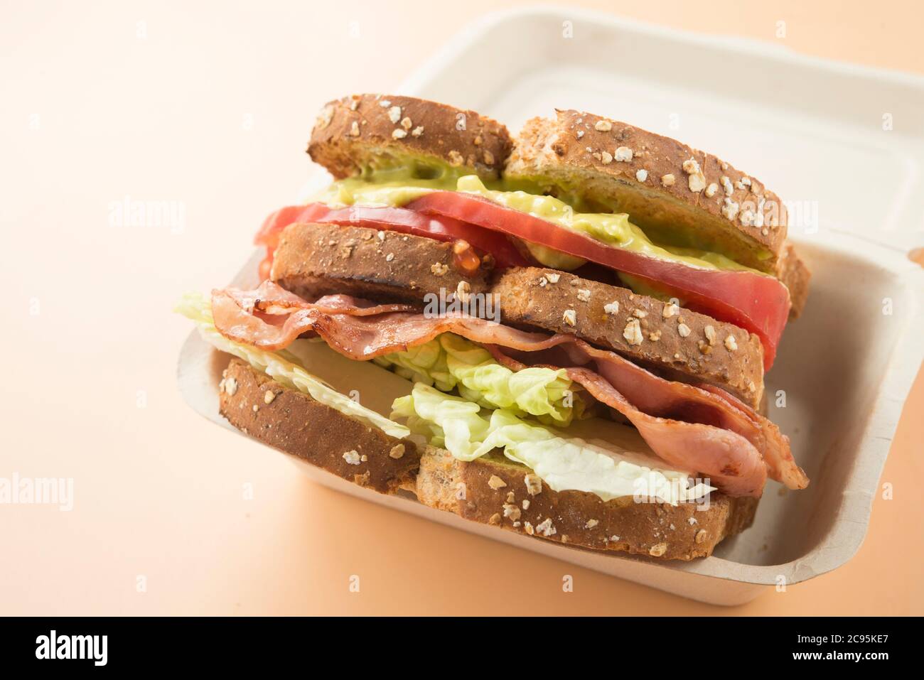 Sandwich LGBT lettuce, guacamole, bacon and tomato Stock Photo - Alamy