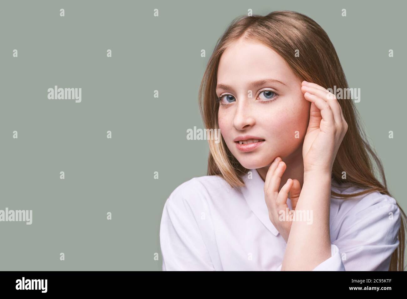 Beauty girl portrait. Young woman. Hand near nead. Face massage concept ...