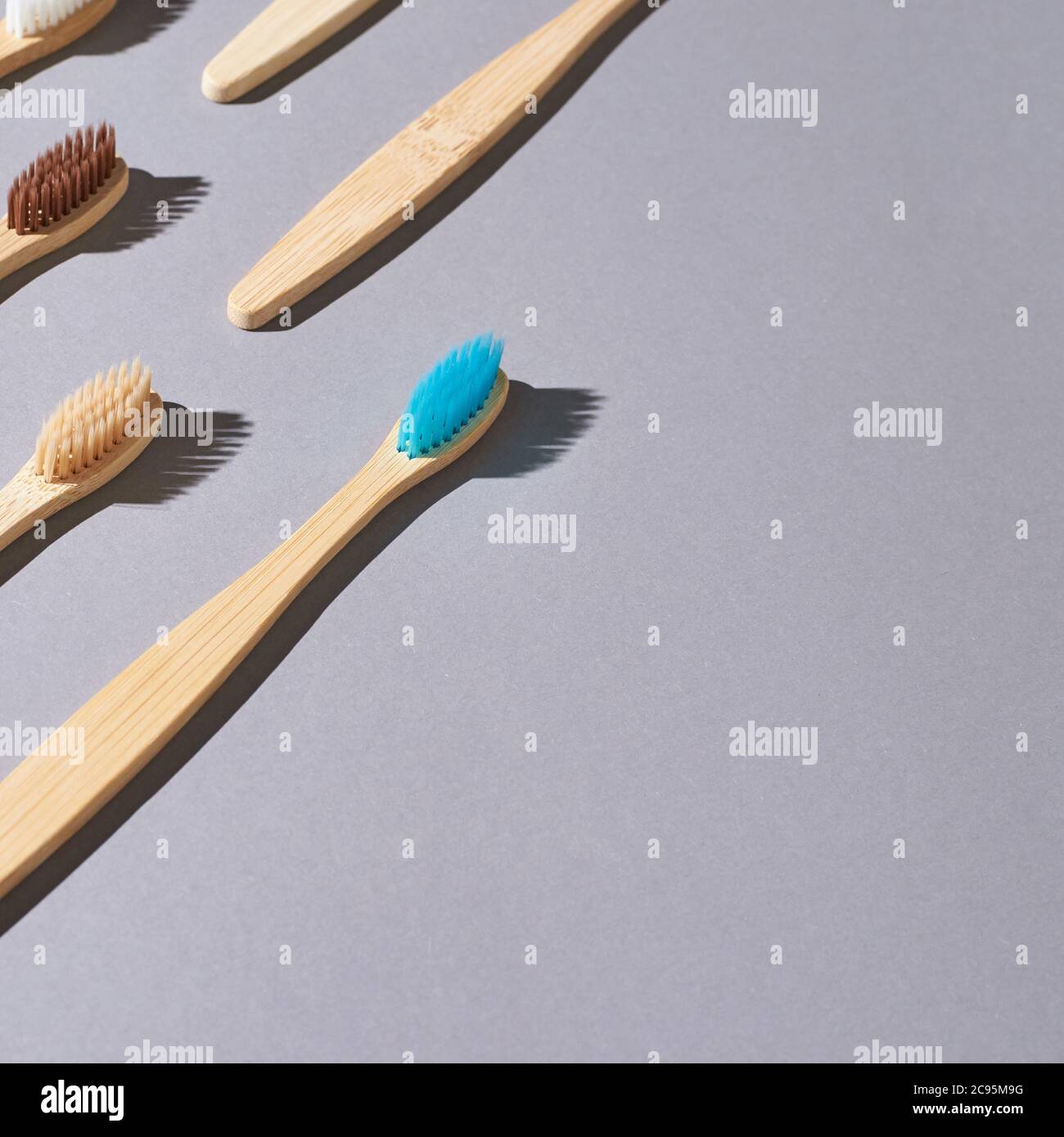 Set of bamboo toothbrushes. Different color Stock Photo - Alamy