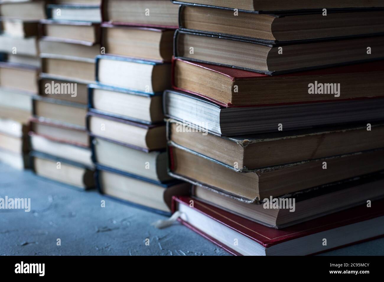 Stack of books background. a lot of books. A stack of books of ...
