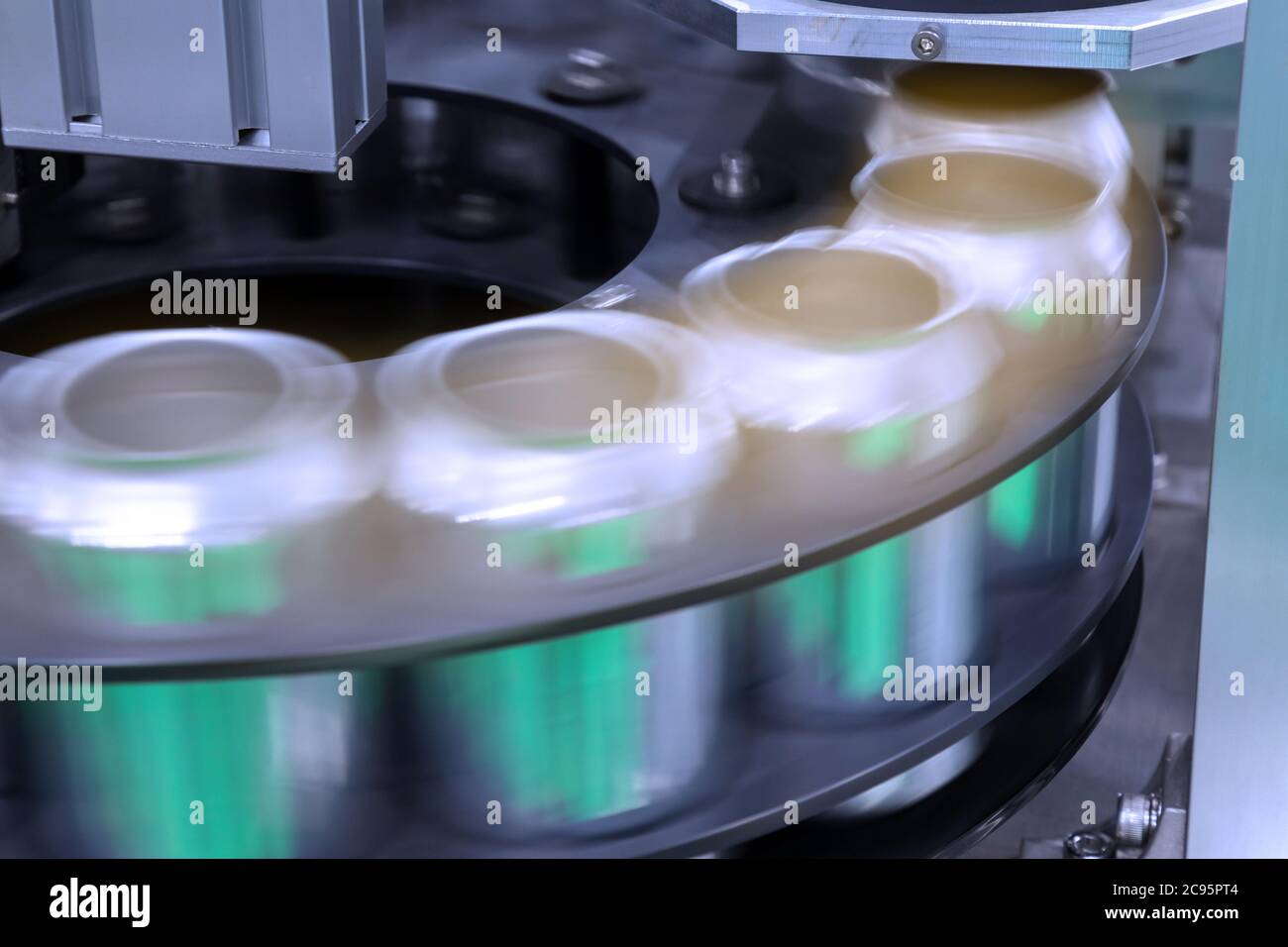 empty new aluminum cans for drink process are moving in factory line on ...