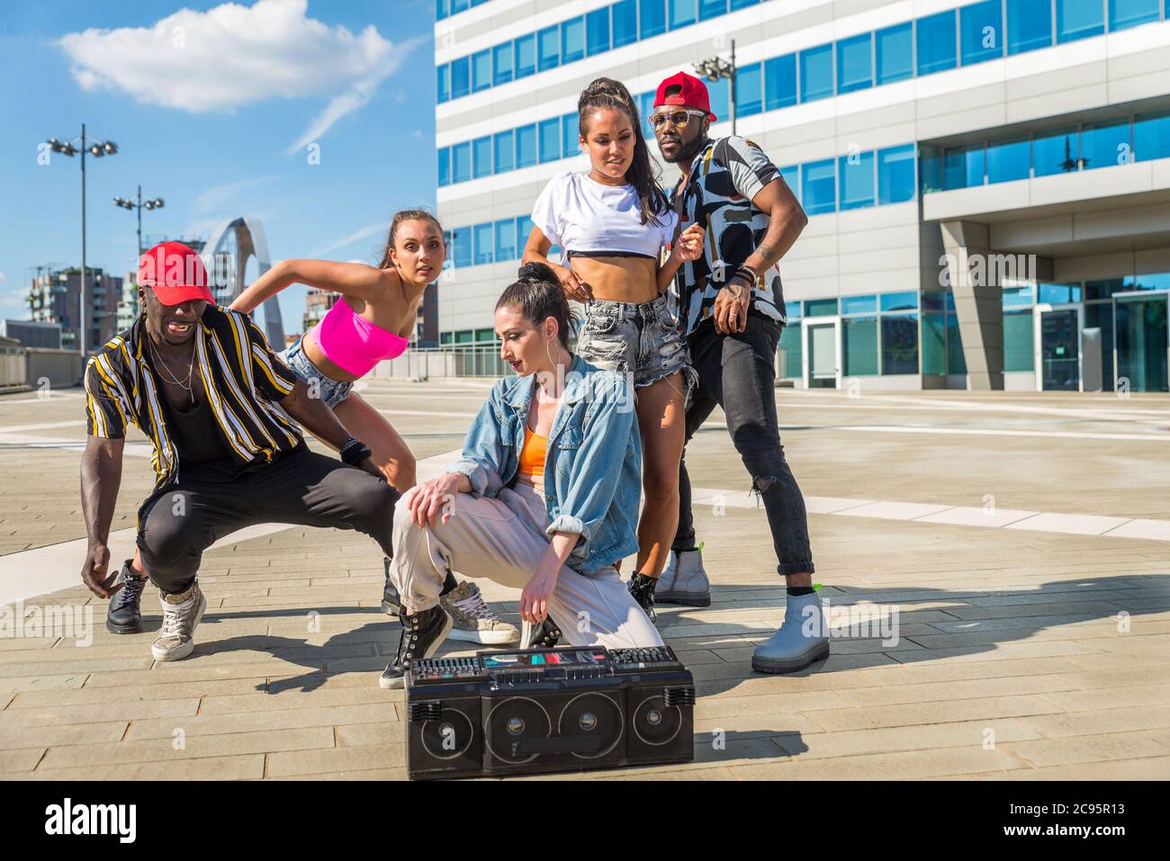 Hip hop crew dancing - Multiracial group of people having fun outdoors ...