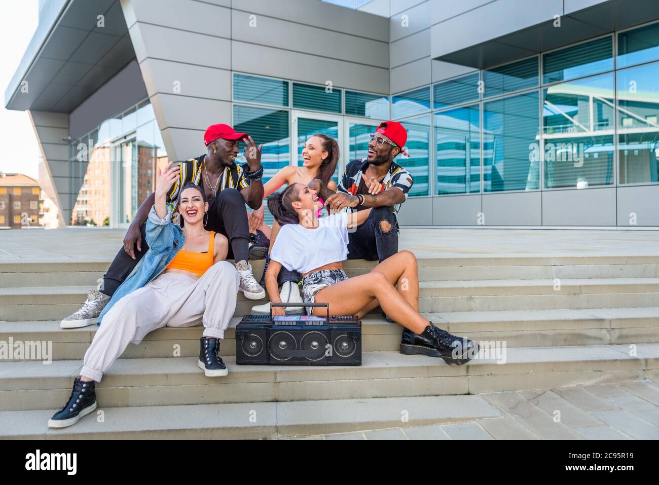 Hip hop crew dancing - Multiracial group of people having fun outdoors ...