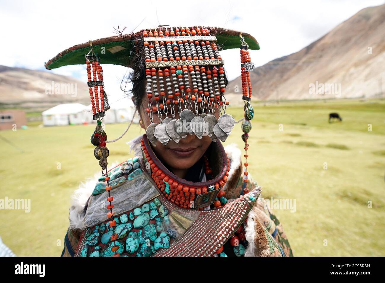 Burang, China's Tibet Autonomous Region. 28th July, 2020. A woman ...