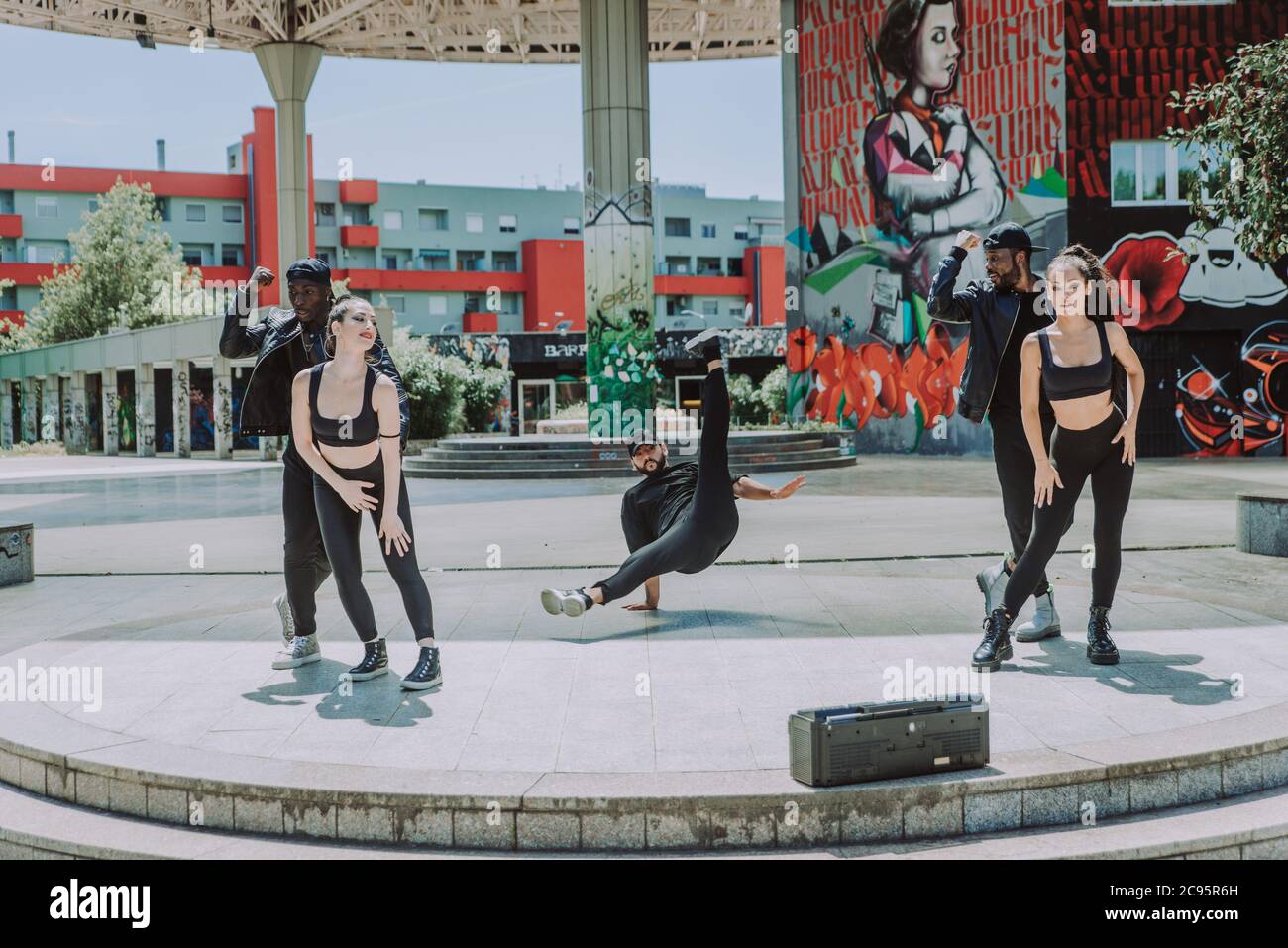 Hip hop crew dancing - Multiracial group of people having fun outdoors ...