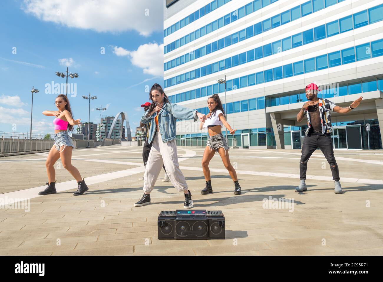 Hip hop crew dancing - Multiracial group of people having fun outdoors ...