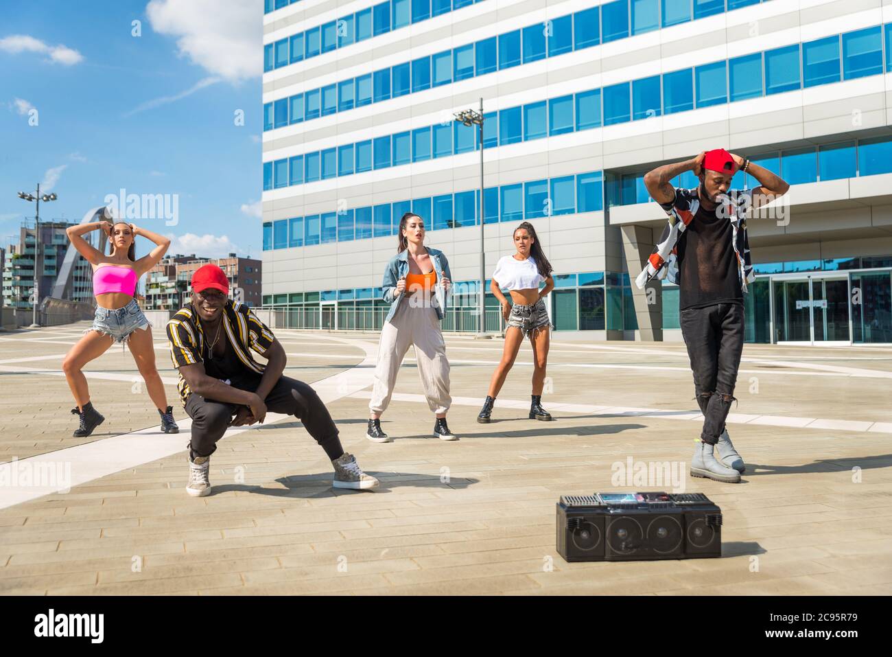 Hip hop crew dancing - Multiracial group of people having fun outdoors ...
