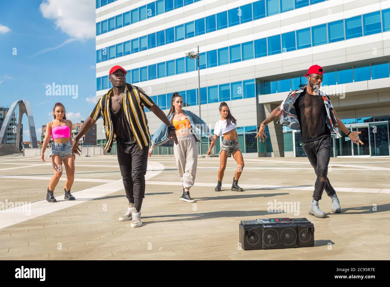 Hip hop crew dancing - Multiracial group of people having fun outdoors ...