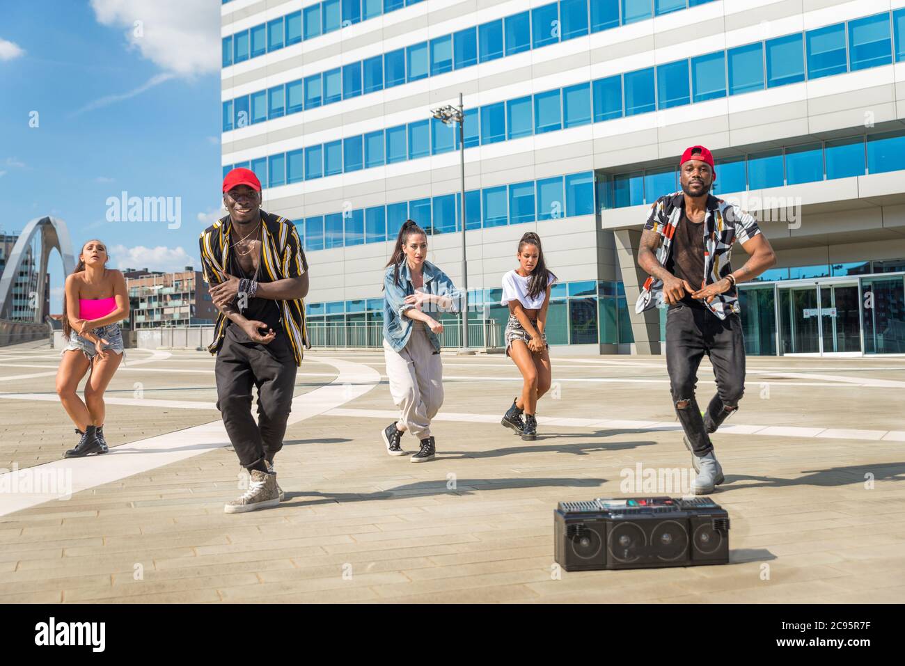 Hip hop crew dancing - Multiracial group of people having fun outdoors ...