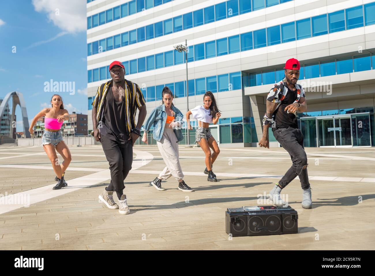 Hip hop crew dancing - Multiracial group of people having fun outdoors ...