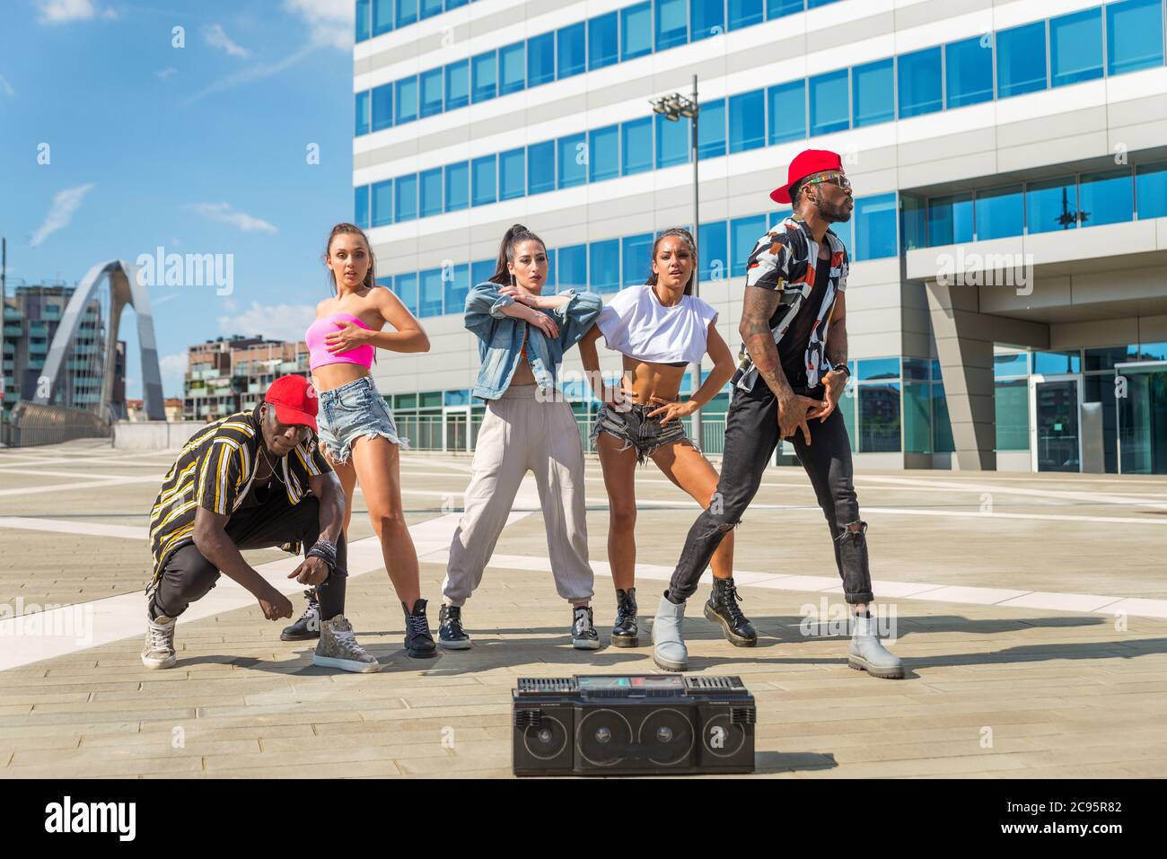 Hip hop crew dancing - Multiracial group of people having fun outdoors ...