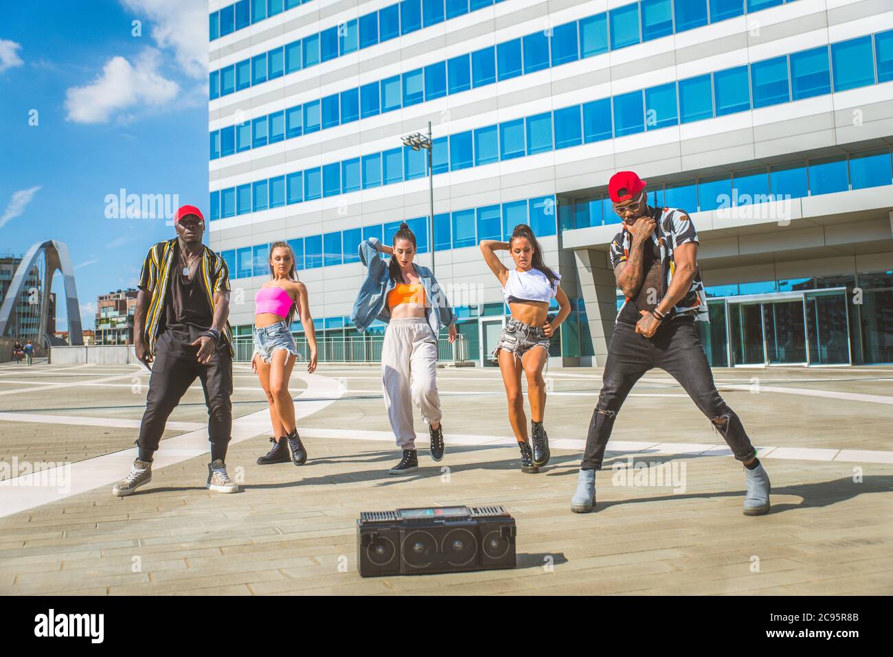 Hip hop crew dancing - Multiracial group of people having fun outdoors ...