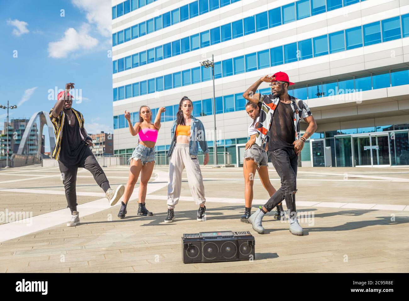 Hip hop crew dancing - Multiracial group of people having fun outdoors ...
