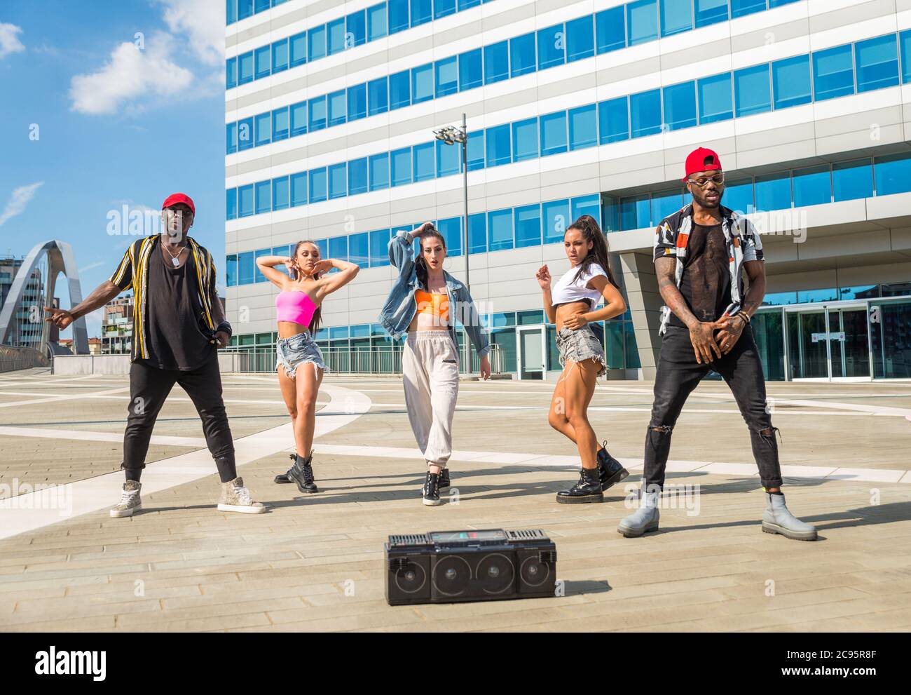 Hip hop crew dancing - Multiracial group of people having fun outdoors ...