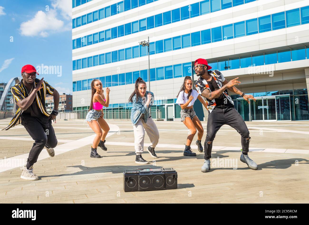 Hip hop crew dancing - Multiracial group of people having fun outdoors ...