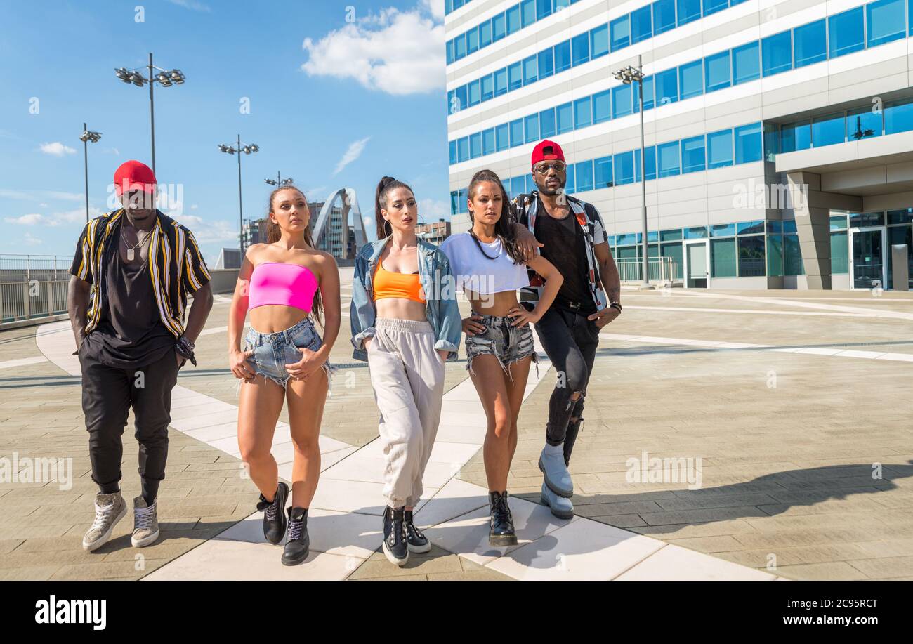 Hip hop crew dancing - Multiracial group of people having fun outdoors ...