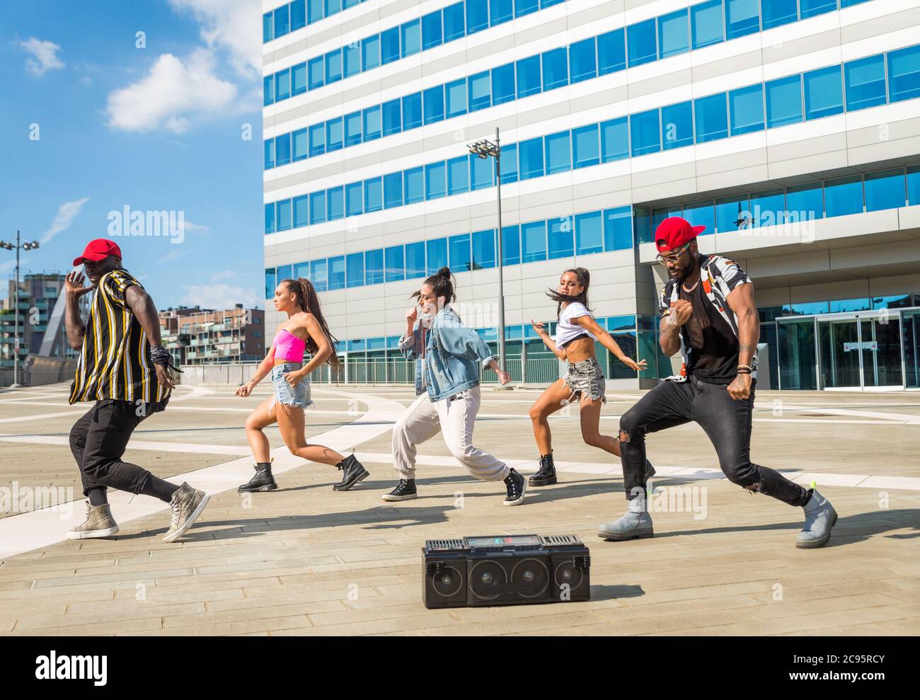 Hip hop crew dancing - Multiracial group of people having fun outdoors ...