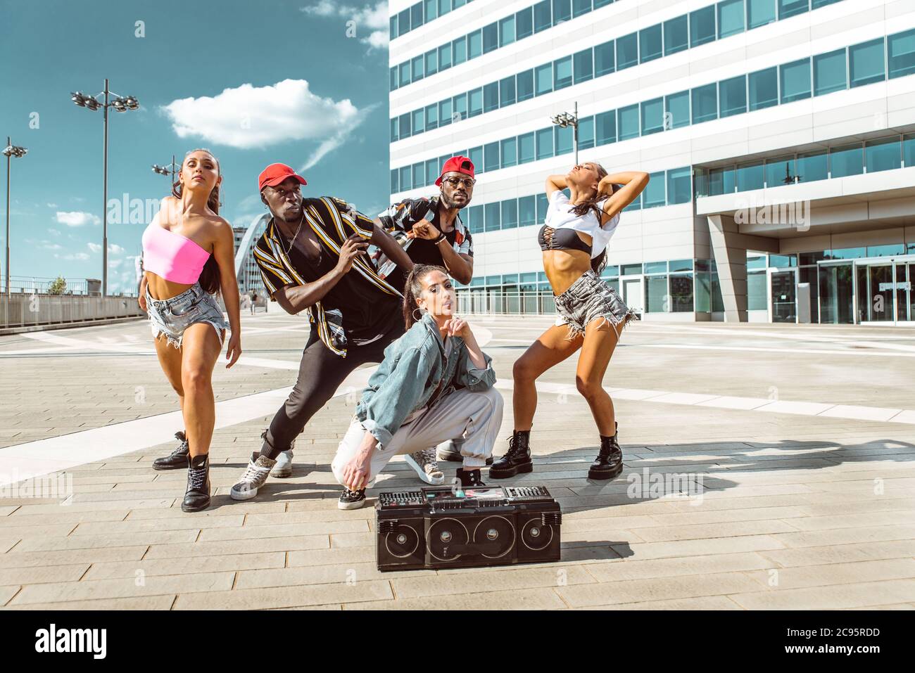 Hip hop crew dancing - Multiracial group of people having fun outdoors ...