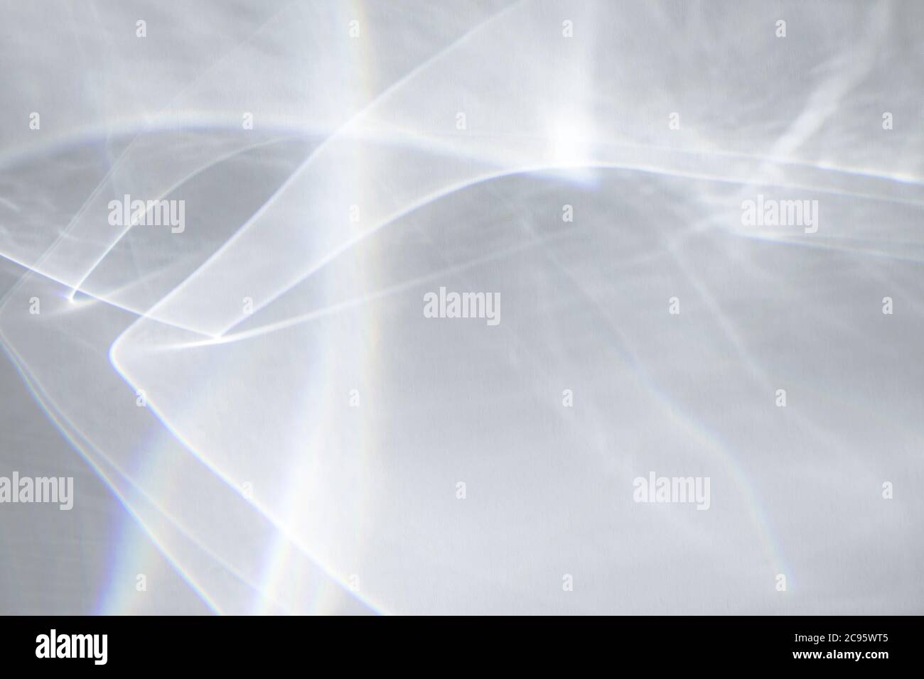 shadow and light caustic effect on a white wall Stock Photo - Alamy