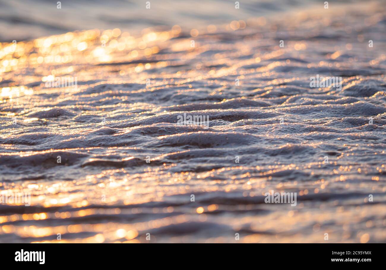 Sunrise over sea wave hi-res stock photography and images - Alamy