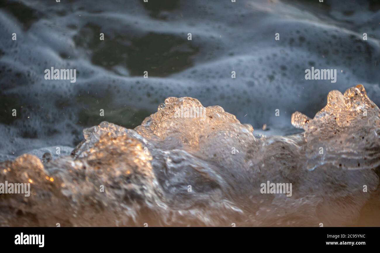 wave splash sea beach macro, close up Stock Photo - Alamy