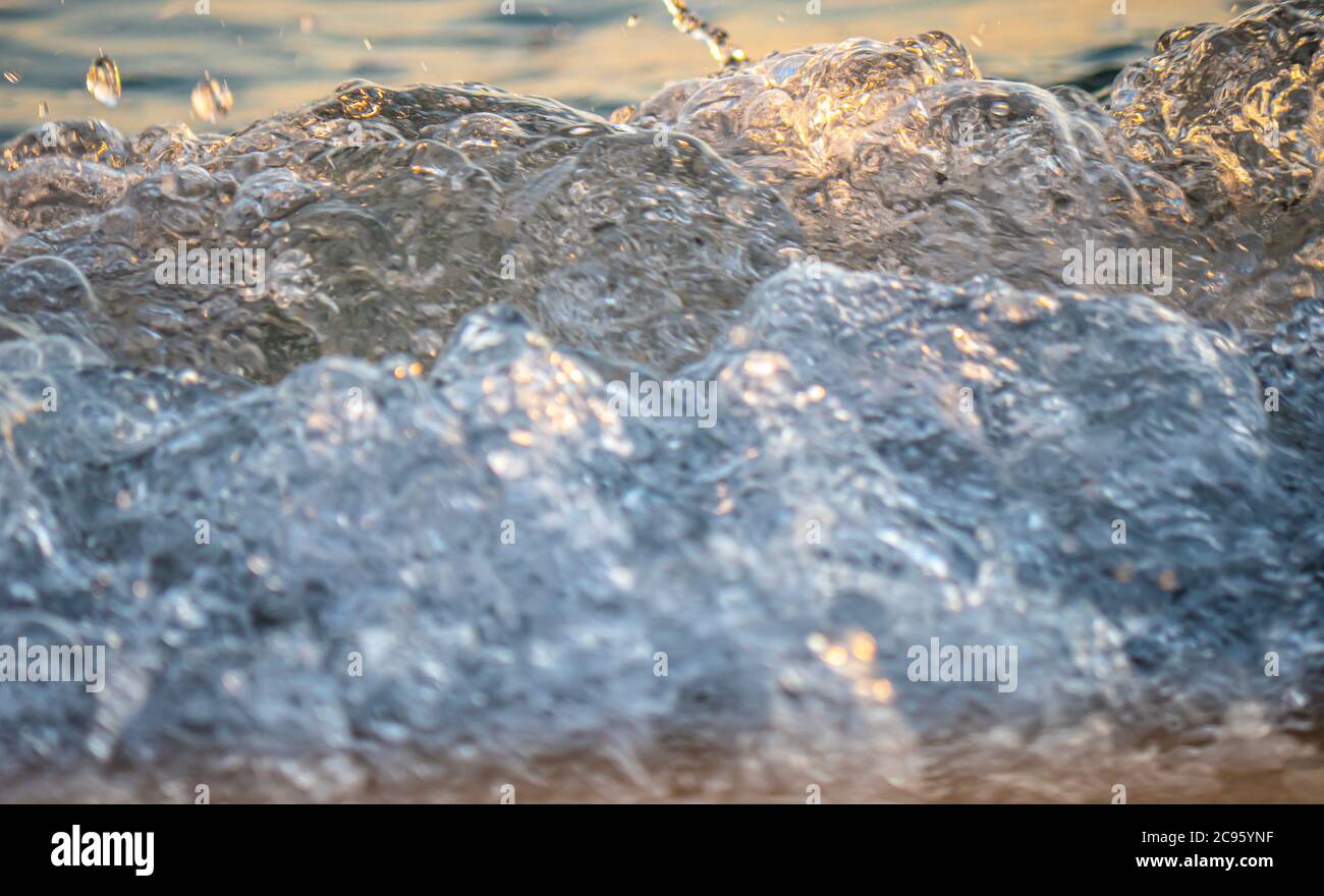 wave splash sea beach macro, close up Stock Photo - Alamy