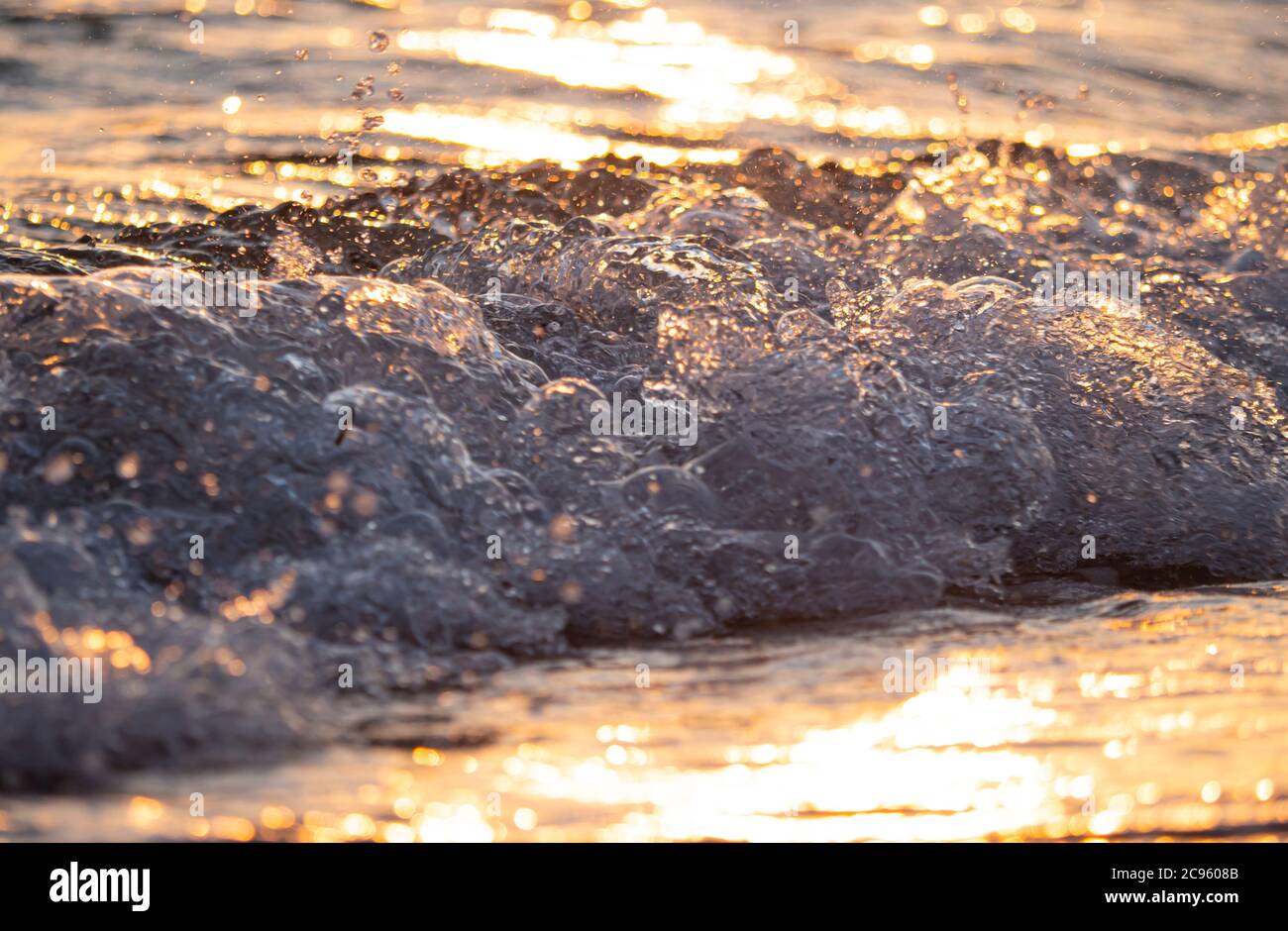 wave splash sea beach macro, close up Stock Photo - Alamy