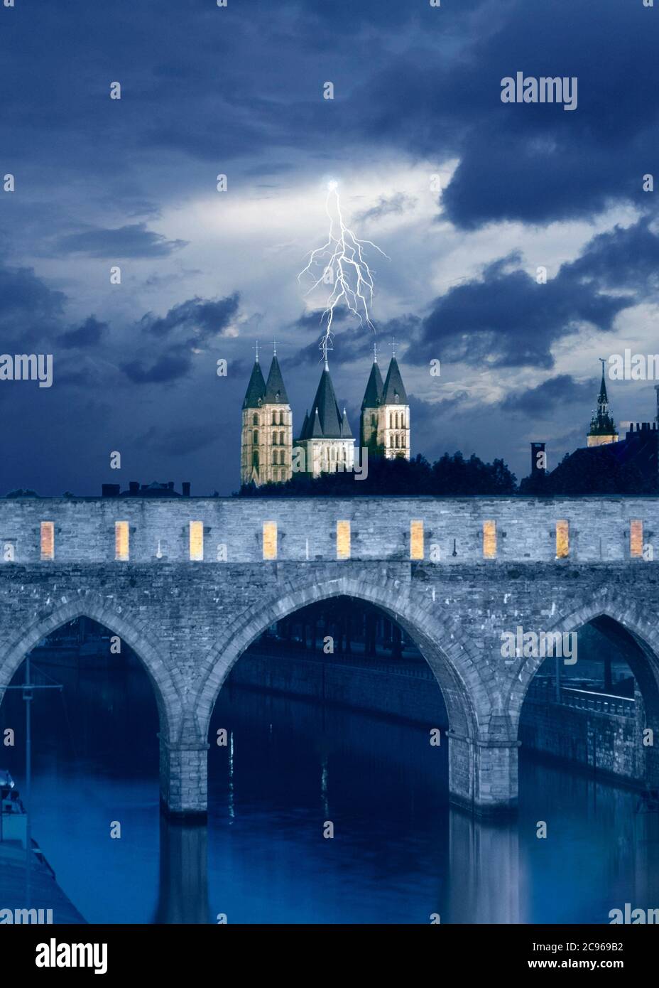 Lightning striking cathedral spire at night Stock Photo - Alamy