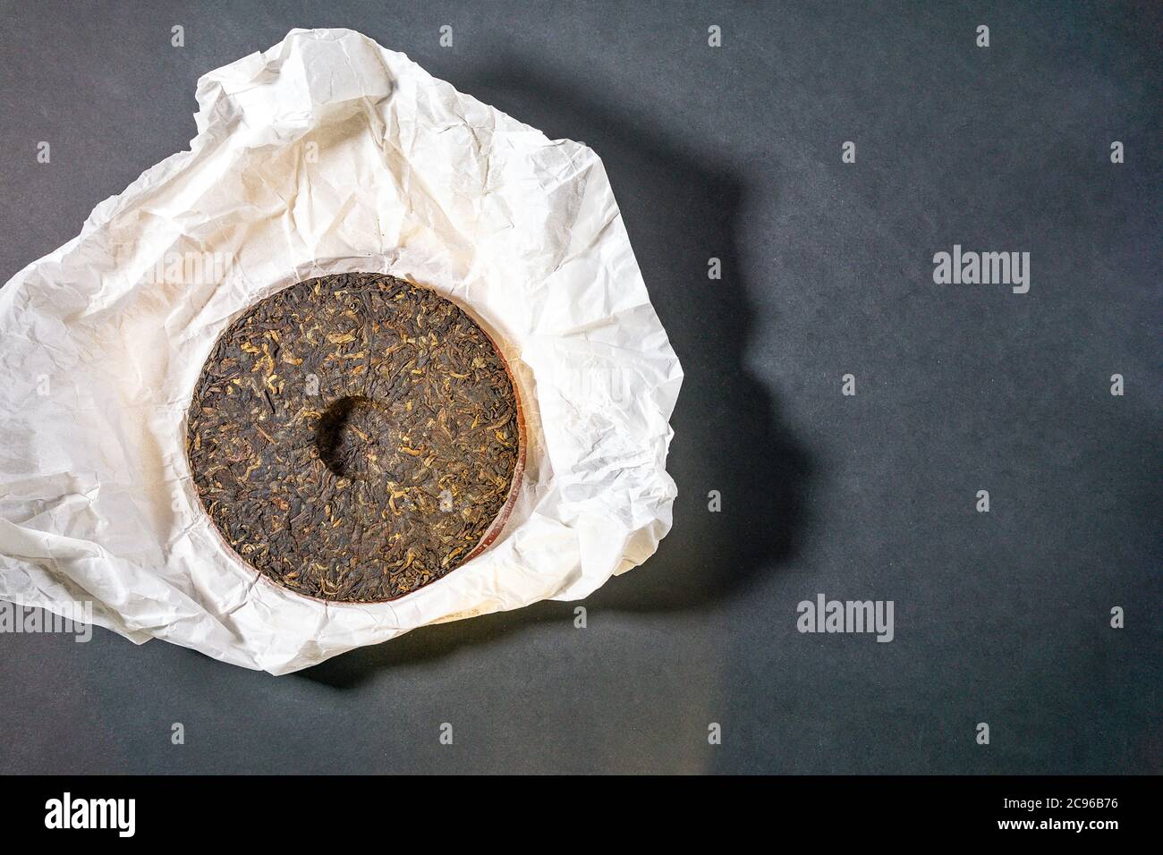 Chinese pressed PU-erh tea, pressed tea top view of a flat lay. Sheng ...
