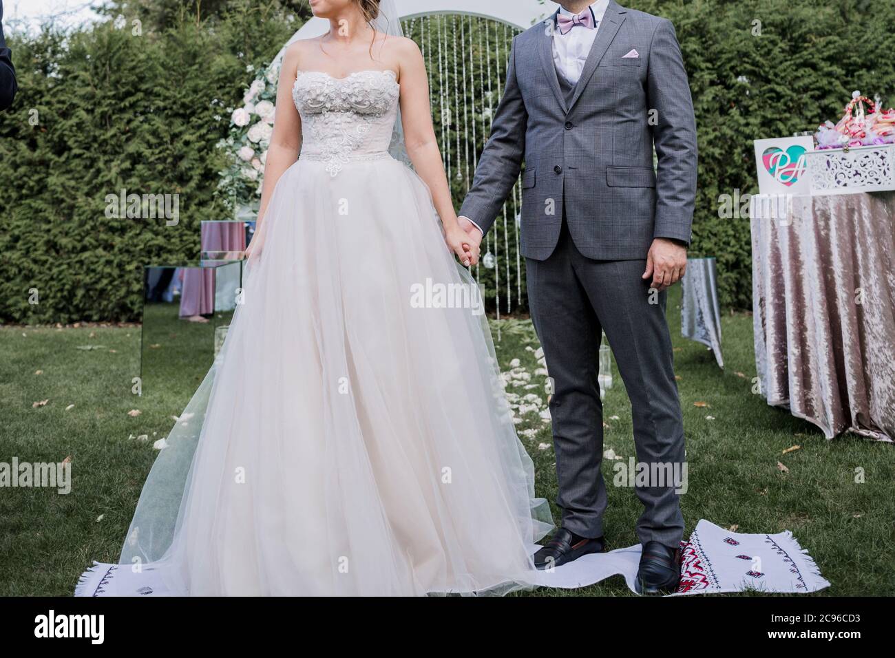 a bride and groom at the wedding ceremony Stock Photo - Alamy