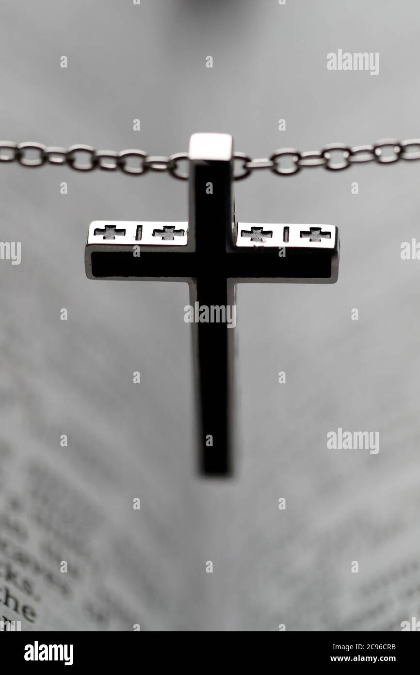 Christian cross over a bible. France Stock Photo - Alamy