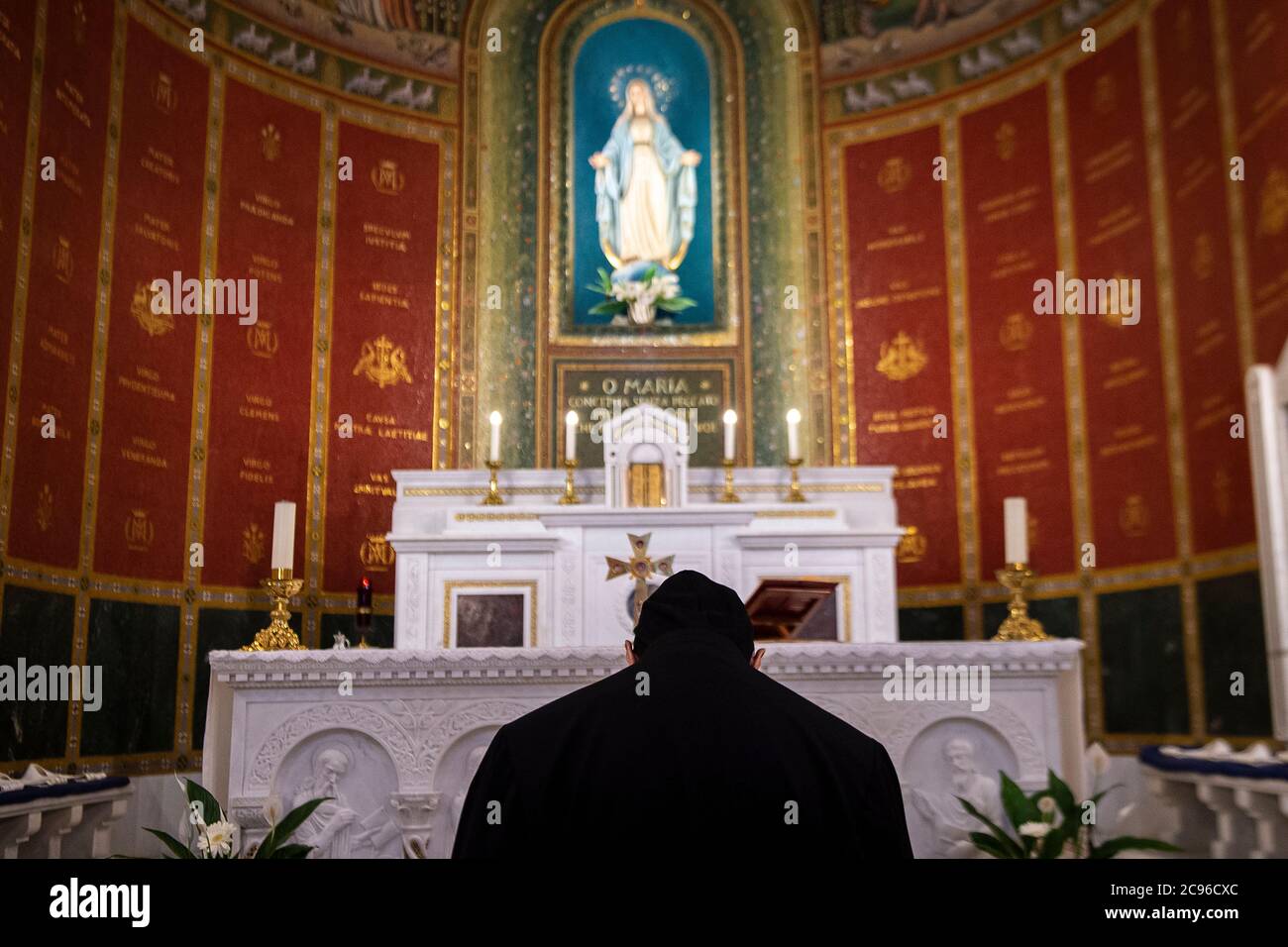 Prayer in the Immaculate Conception Church inside St Charbel monastery ...
