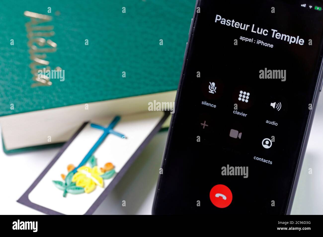 Image on a smartphone. Call to a Pastor. France Stock Photo - Alamy