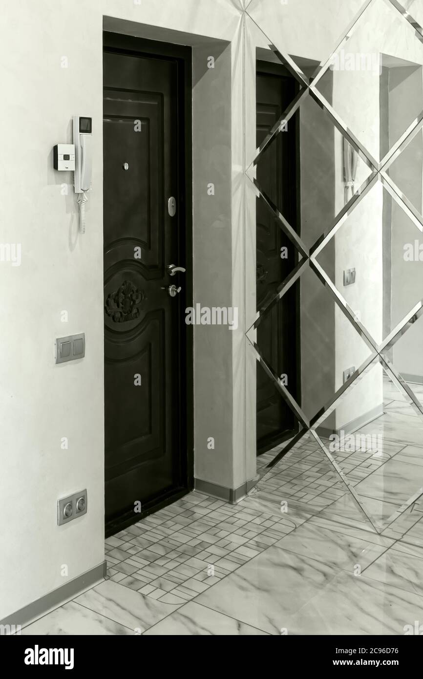 Modern wooden looking front door, very sturdy steel door Stock Photo ...