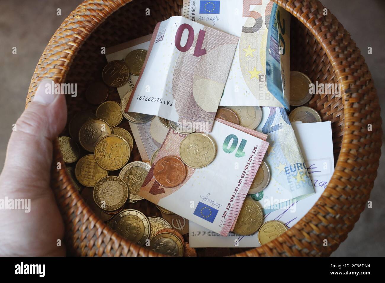 Church Collection Basket High Resolution Stock Photography and Images ...