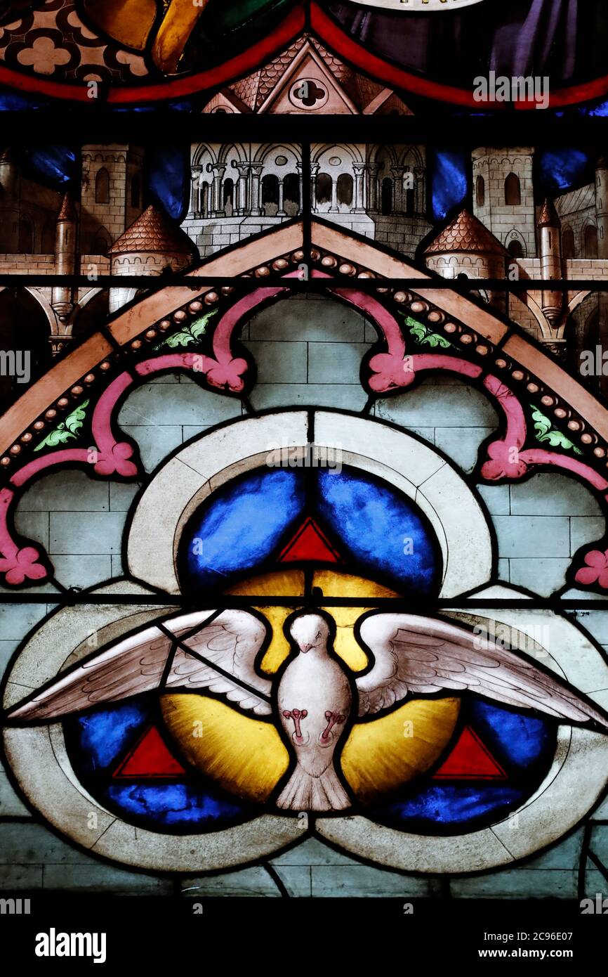 Basilica of Our Lady of Geneva. Stained glass window. Dove of Holy ...