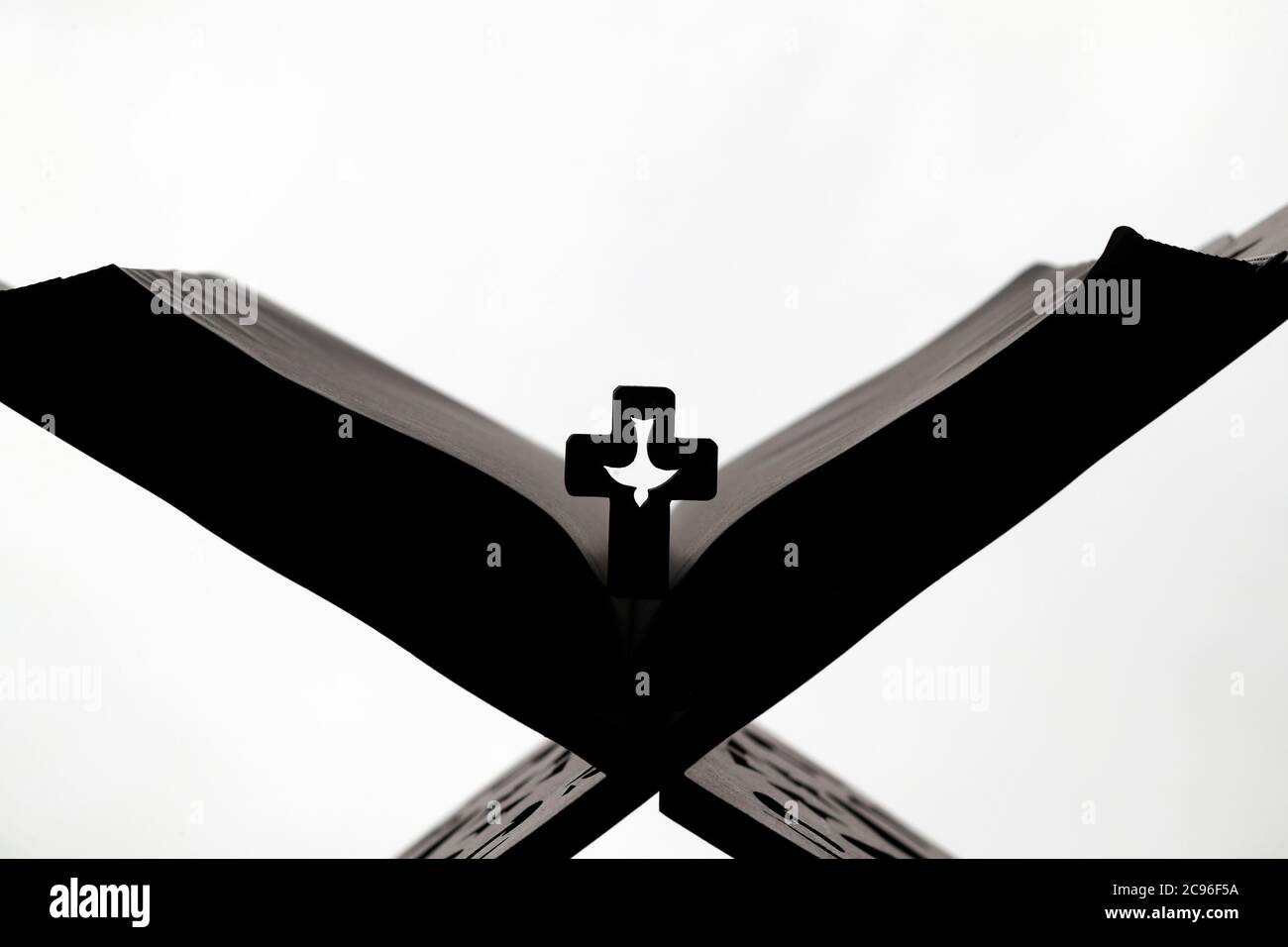 Cross of the order of the Holy Spirit on an open bible. France Stock ...