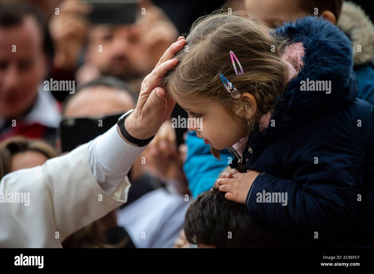 Pope Francis blesses a child during his weekly general audience in St ...