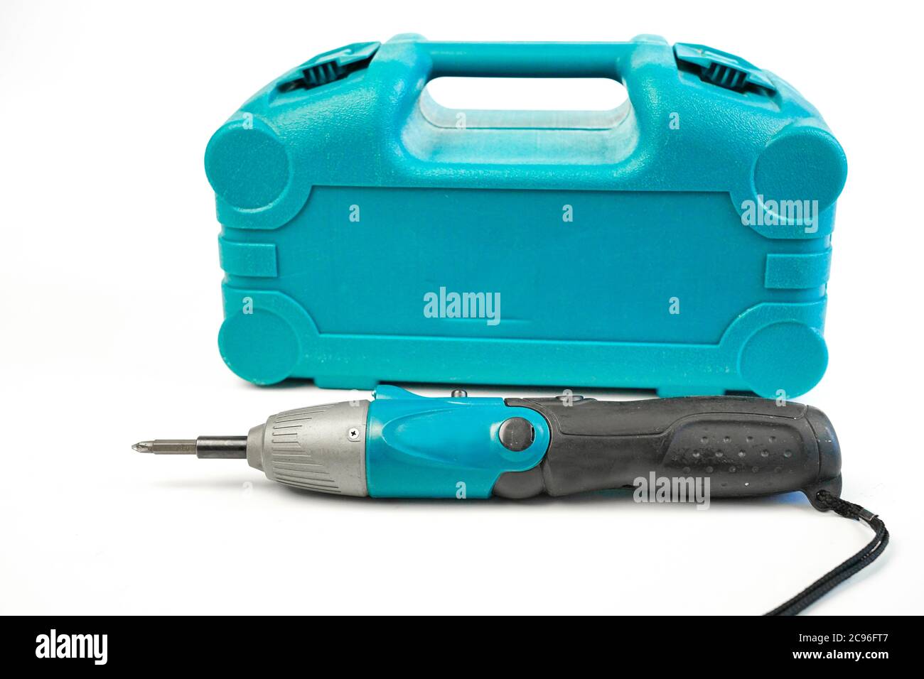 Electric screwdriver lies next to the drawer with a set of screwdrivers ...