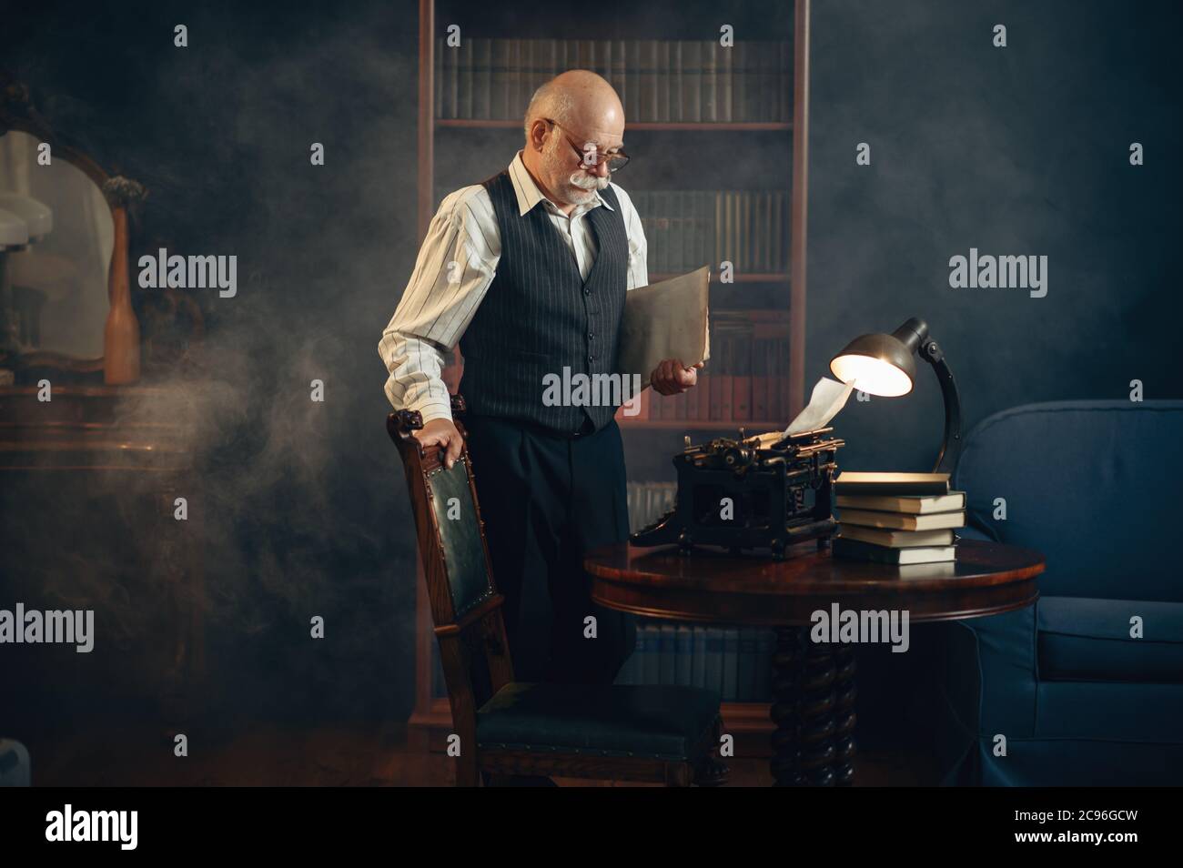Write book old man hi-res stock photography and images - Alamy