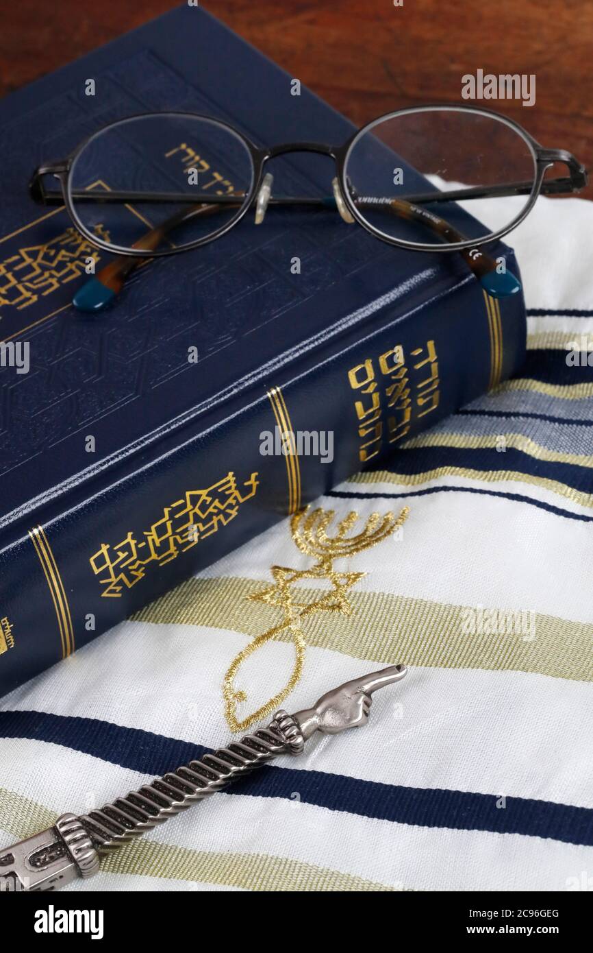 Sylver yad, tallit and Torah. Jewish symbols. France Stock Photo - Alamy